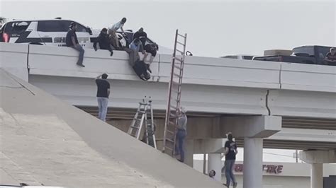 Texas Deputy Rescued After Dangling From Overpass In Crash