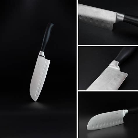 콜라주 칼날 검은색 바탕에 검은색 플라스틱 손잡이가 있는 큰 부엌 칼 프리미엄 사진