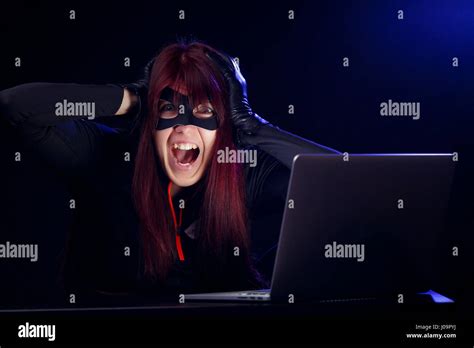 Girl Hacker In Black Mask Stock Photo Alamy