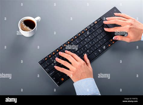 Woman S Hands On Wireless Keyboard Stock Photo Alamy