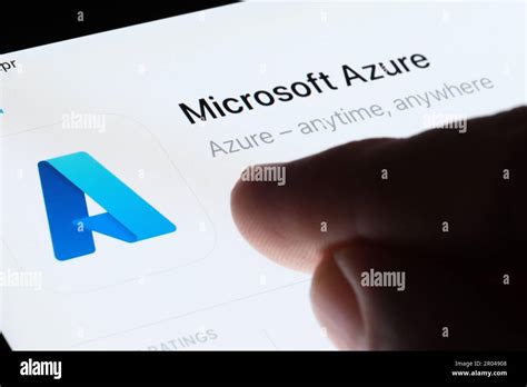 Microsoft Azure App Seen In App Store On The Screen Of Ipad And Blurred Finger Pointing At It
