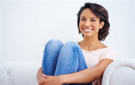 Theres Nothing Like A Day Off Portrait Of A Young Woman Relaxing At