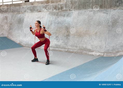 Fitness Girl Squats With Resistance Band Fit Woman Doing Cardio