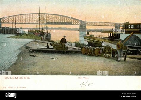 Gezicht Op De Spoorbrug Over De Lek Te Culemborg Met Rechts Op De Voorgrond De Veerboot Stock
