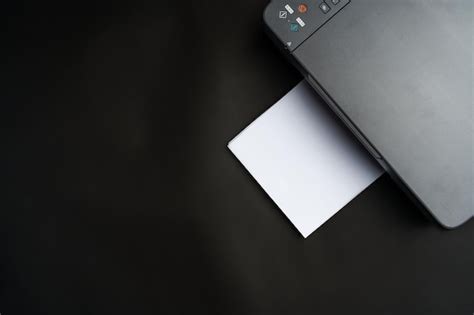 Premium Photo Modern Laser Printer On Black Background Close Up