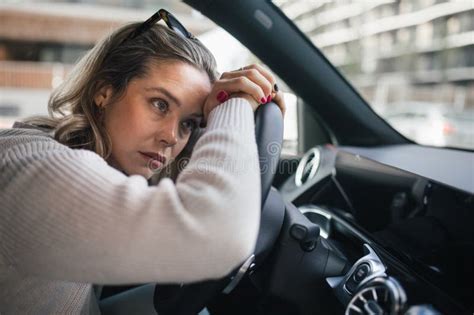 Upset Woman Driving Her Car In A City Stock Image Image Of City