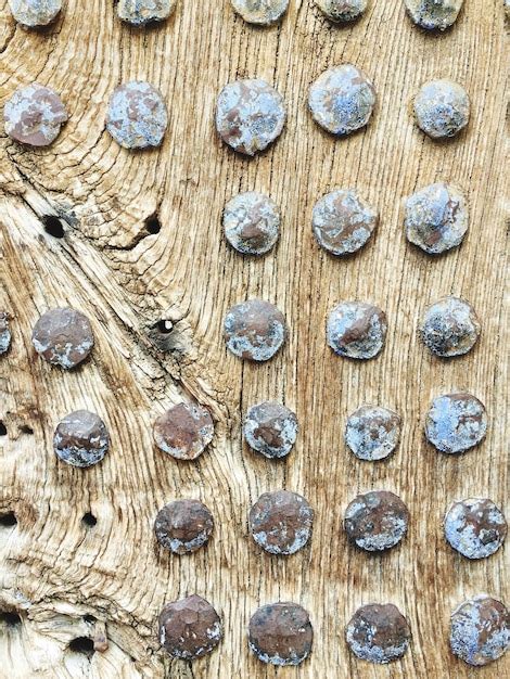 Premium Photo Full Frame Shot Of Rusty Nuts On Table
