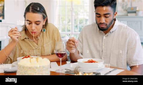 Date Funny And Couple Eating Spaghetti On A Romantic Dinner At A