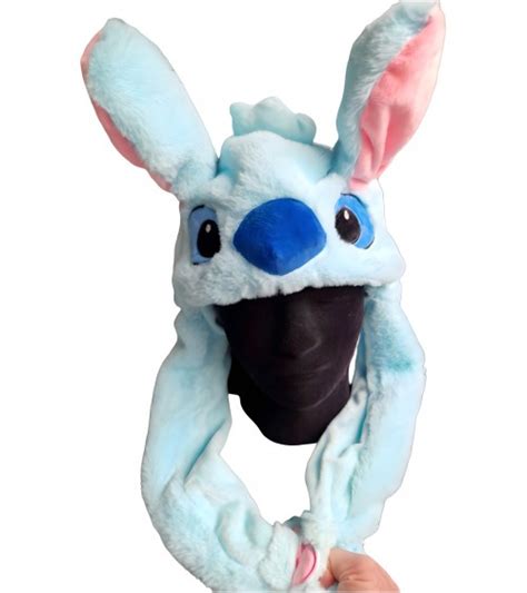 CHAPEAU BONNET BLEU AVEC LES OREILLES QUI BOUGENT