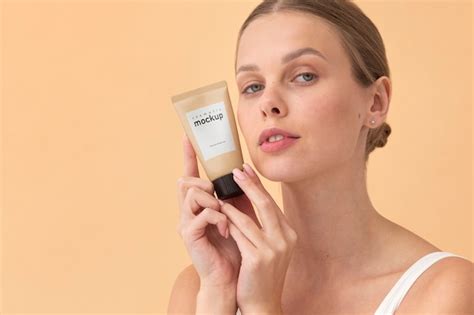Premium Psd Medium Shot Woman Holding Cream