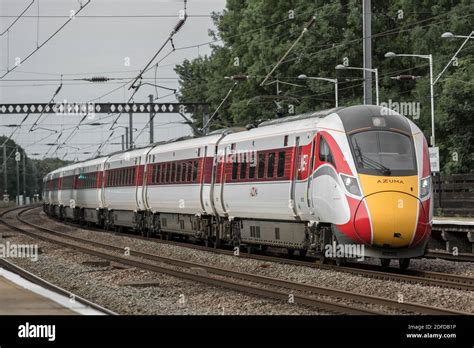 Azuma High Speed Train In Lner Livery Speeding Through A Railway