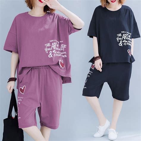 Swan Shop ชุดเซ็ตลำลองผู้หญิง เสื้อยืด กางเกงขาสั้น ลายตัวอักษรพร้อมรูปหัวใจ ใส่สบาย Shopee