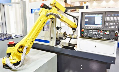 Robotic Arm And Cnc Lathe Stock Photo Image Of Metal 152391238