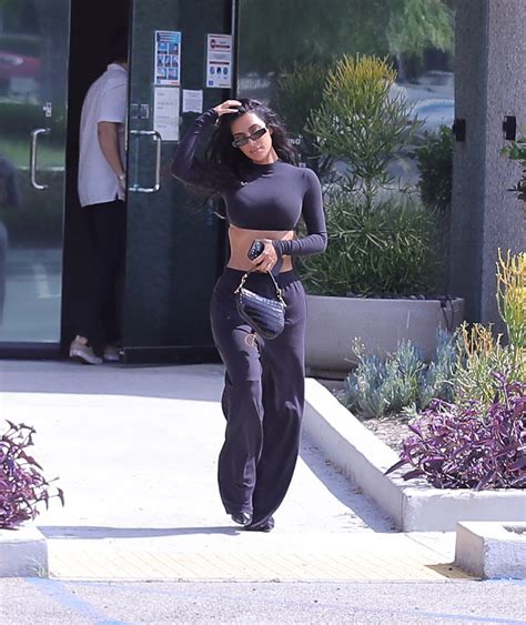 Kim Kardashian Shows Off Her Impossibly Tiny Waist And Famous Butt In