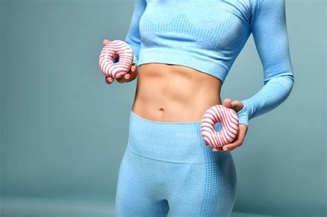 Premium Photo Cropped Photo Of Perfect Female Abs Girl In Sports