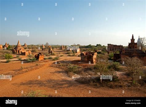 Golden Glowing Red Brick Temple Spires At Sunset Bagan Myanmar Burma