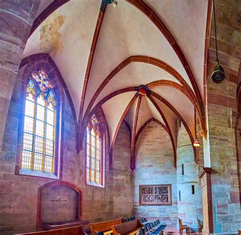 The Side Aisle Of Basel Minster Cathedral With Large Windows And Rib