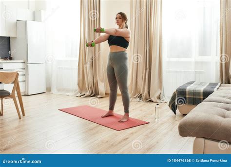 Celebrating Health Full Length Shot Of Young Curvy Woman In Sportswear