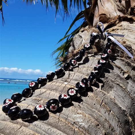 Hawaiian Kukui Nut With Hand Painted White Hibiscus Lei Etsy White Hibiscus Hawaiian Lei
