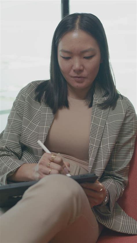 Woman Making Notes On A Tablet With A Stylus Free Stock Video