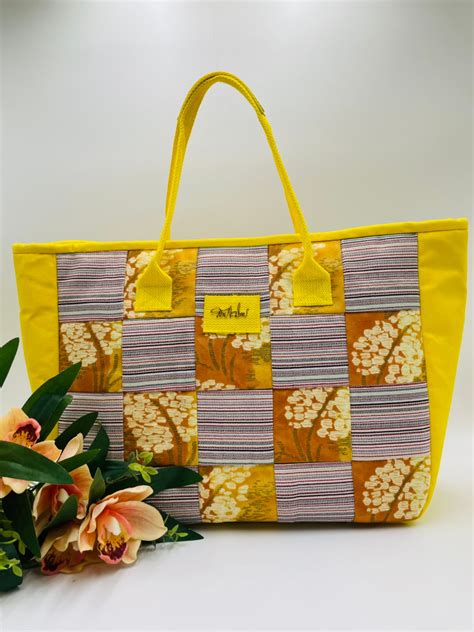 มลนธสายใจไทยในพระบรมราชปถมภ CS 101 กระเปาผาตอสเหลยม