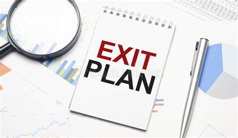 Exit Plan Words On The Notepad And Pen With Charts Stock Image Image Of Business Strategy