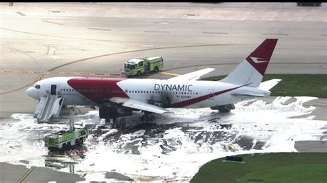 Passengers Use Emergency Slides After Planes Engine Bursts Into Flames