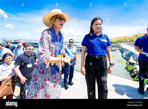 Talim Island Queen Maxima Visits Card Mri And Pioneer Insurance On