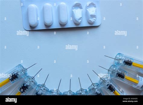 Combination Of Pills And Injections As New Medical Vaccines Ready For Injection With Syringe And