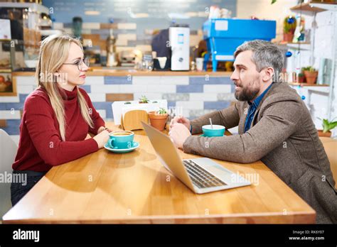 Talk In Cafe Stock Photo Alamy