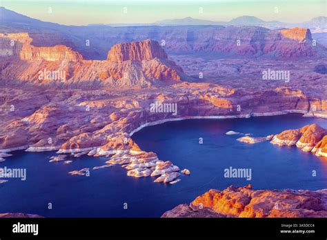 Landscape Under The Wing Of An Airplane The Coast Of Lake Powell Is Cut By Narrow Canyons U S