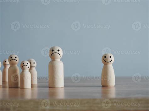 A Wooden Puppet Wooden Cube With A Happy Smiley Face Separating From A