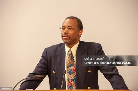 Neurosurgeon And Politician Ben Carson Speaking From A Podium During
