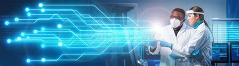 Group Of Microelectronic Engineers Discussing In A Modern Microprocessor Manufacture Lab