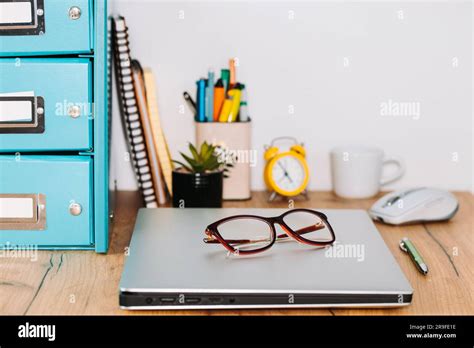The Closed Notebook Computer Was Placed On The Desk In The Office