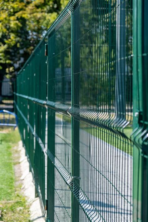 Steel Grating Fence Of Soccer Field Metal Fence Wire With Grass In The