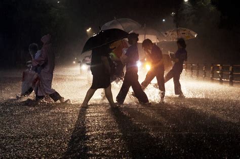 People Trapped On Top Of Cars And Shops Full Of Water Photos On Social