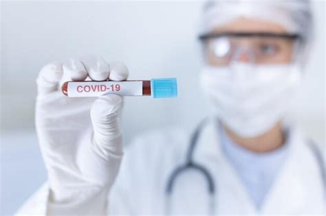 Premium Photo Caucasian Female Healthcare Worker Wearing A Lab Coat