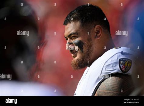 Baltimore Ravens Guard Daniel Faalele Talks To Teammates On The Sidelines During Introductions