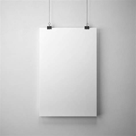 Premium Photo A Blank Piece Of Paper Hanging On A Wall With A Picture