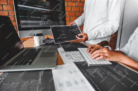 Premium Photo | Developing programmer reading computer codes Development Website design and ...