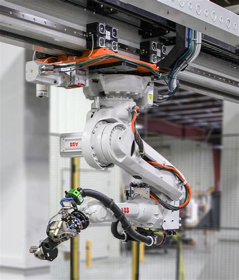 Custom Robotic Load And Unload Cell Mesh Automation