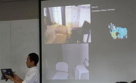 the robot grabs objects that are randomly stacked news teamwork
