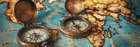 Premium Photo Two Antique Compasses Laying On A World Map