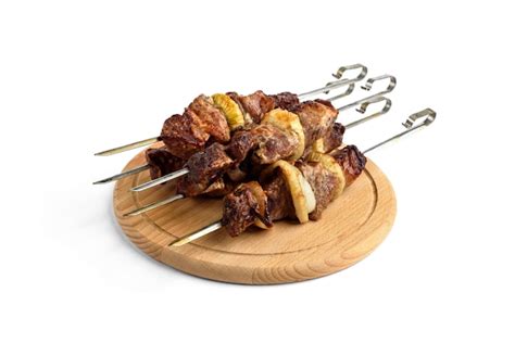 Premium Photo Pork Shish Kebab Skewers On Wooden Cutting Board