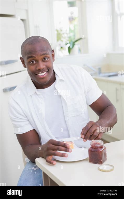 Portrait Smiling Man Taking His Breakfast Stock Photo Alamy