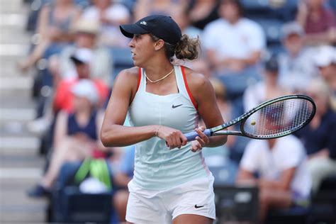 Download Madison Keys Displaying Athleticism In Tennis Attire Wallpaper