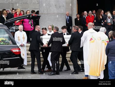 Michael Dennany Second Left Carries The Coffin Bearing The Remains Of