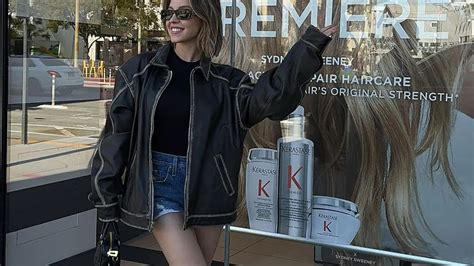 Sydney Sweeney Stuns In Tiny Denim Hotpants And Knee High Boots As She