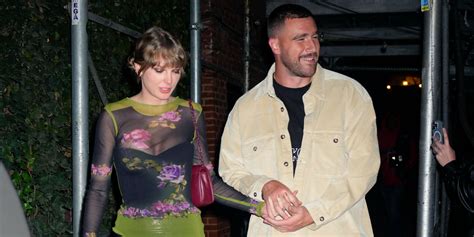 A New Photo Of Taylor Swift Kissing Travis Kelce Has Emerged Elle